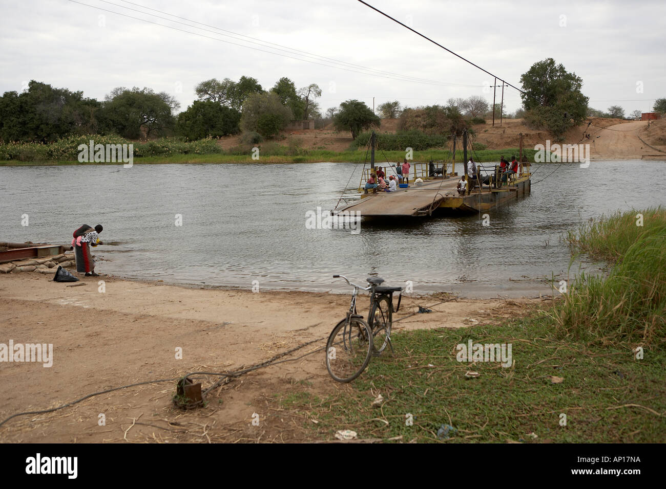 People crossing the Kafue River on a pontoon Zambia Africa Stock Photo ...