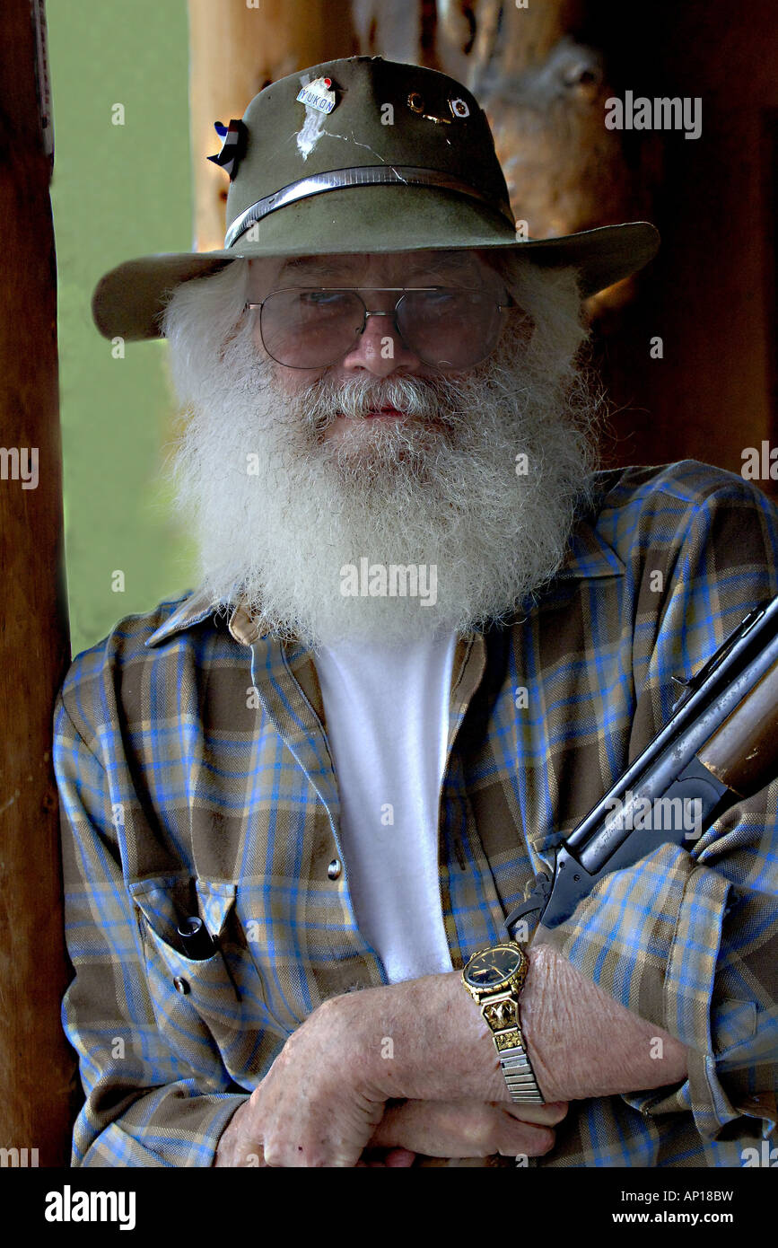 Man with Rifle in Alaska, USA Stock Photo - Alamy