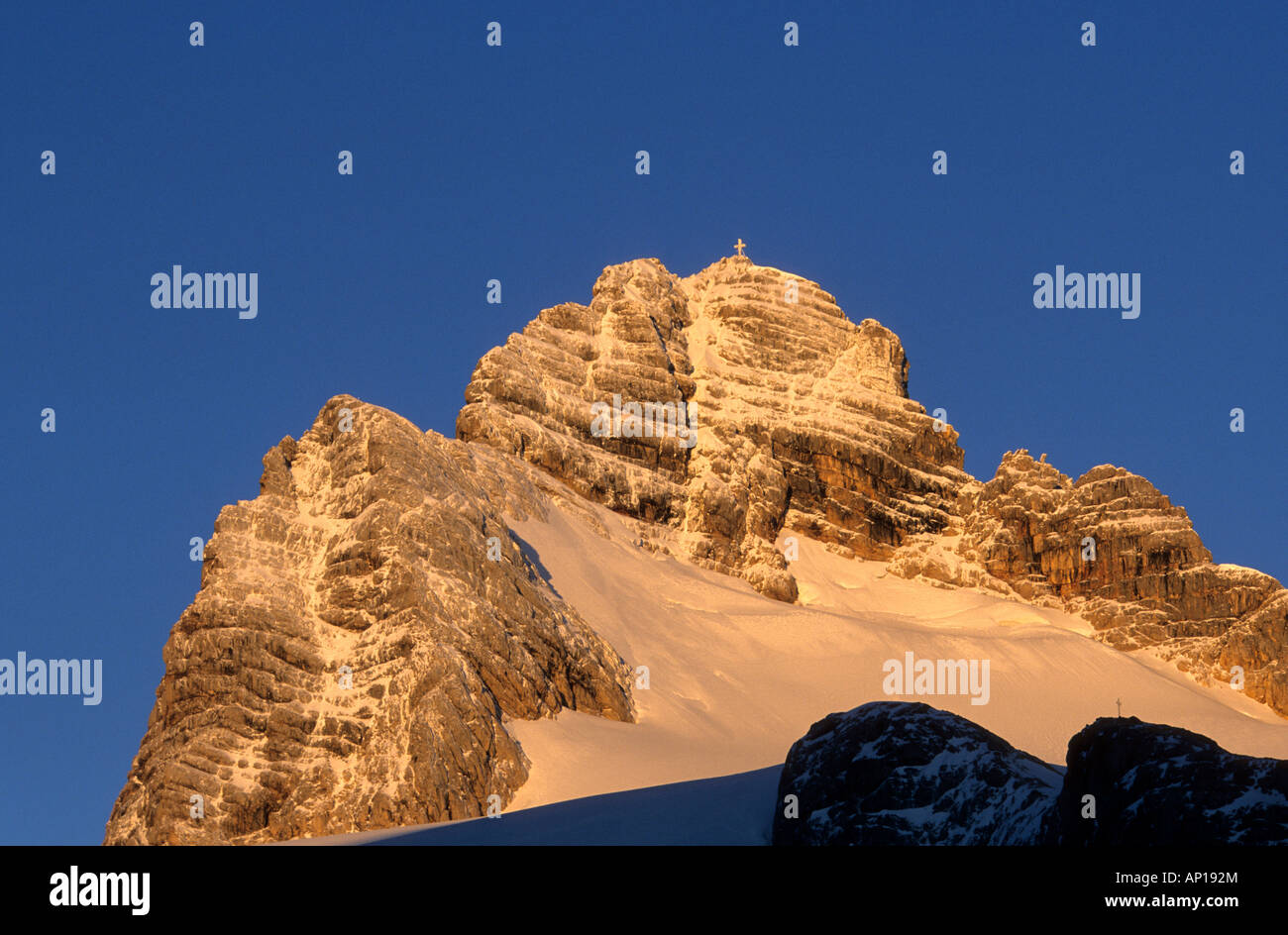 Hoher Dachstein in morning light towering above Hallstaetter Gletscher ...