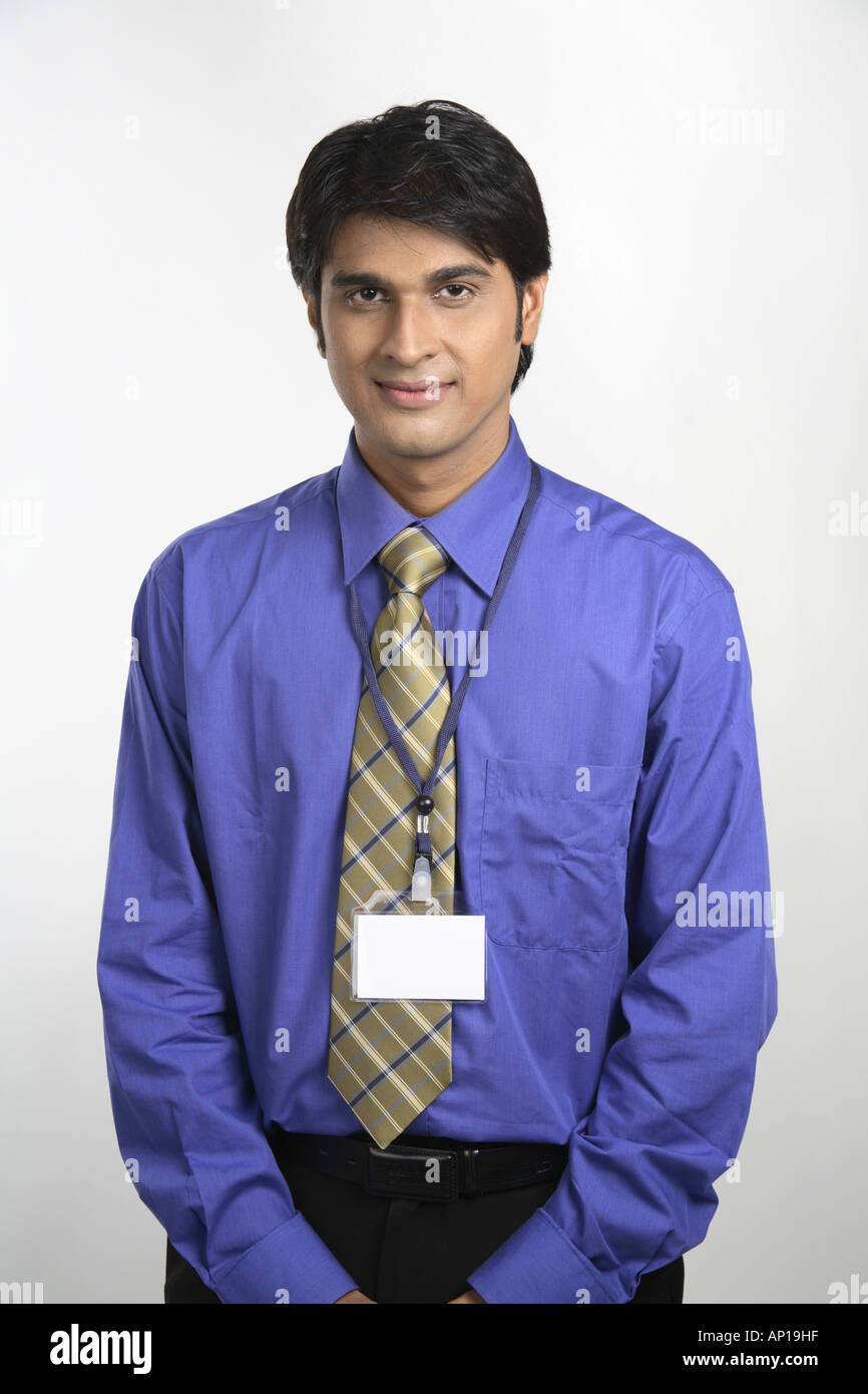 ANG200105 Executive with Identity card around neck Stock Photo - Alamy