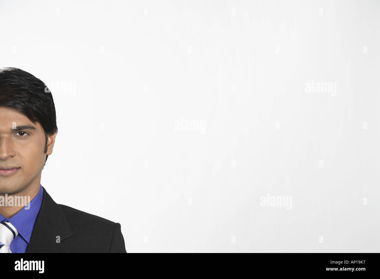 ANG200123 Profile of half face smiling wearing formal clothes Stock ...