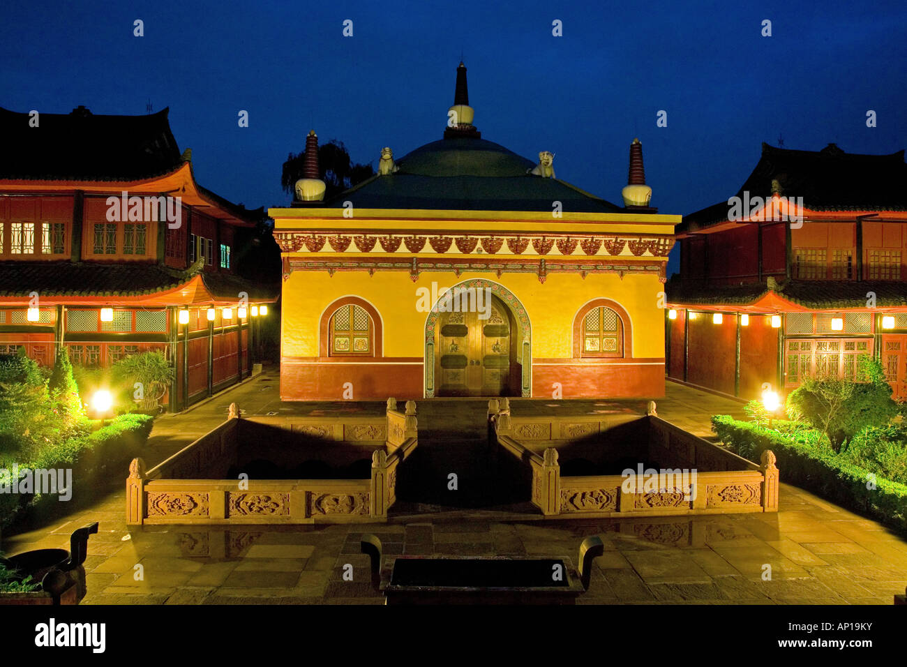 Illuminated buildings of the Wannian Monastery at night, Emei Shan ...