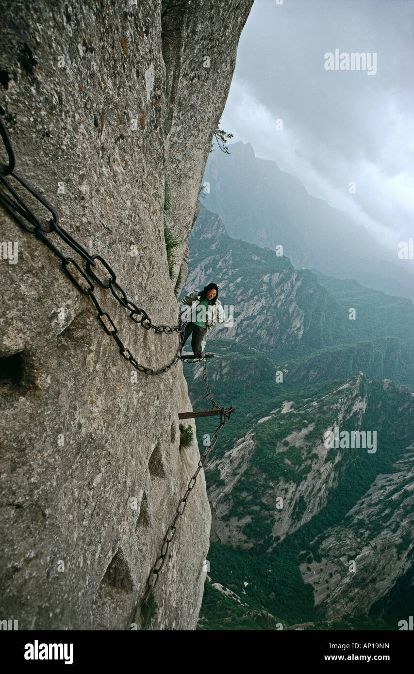 Chaines ensuring pilgrimage route at a steep rock face, Hua Shan ...