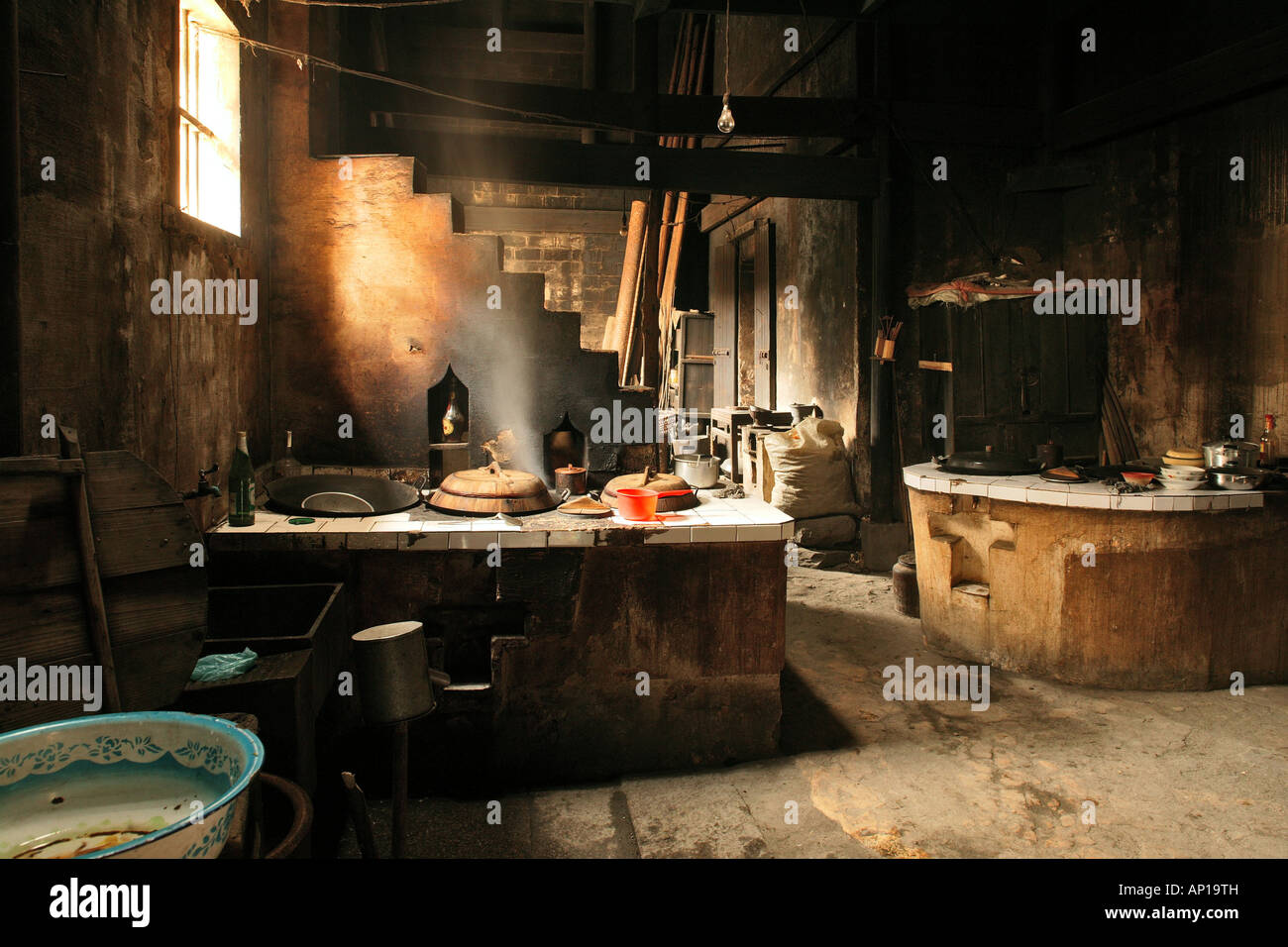 Interior view of a traditional kitchen in an old timber farmhouse ...