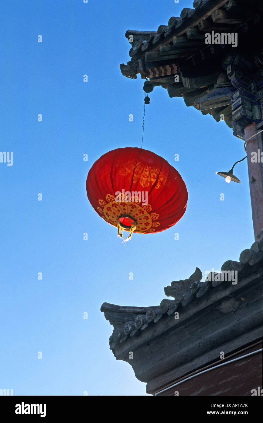 Red lantern hung at a gate and high walls of Luo Hou Temple, Mount ...