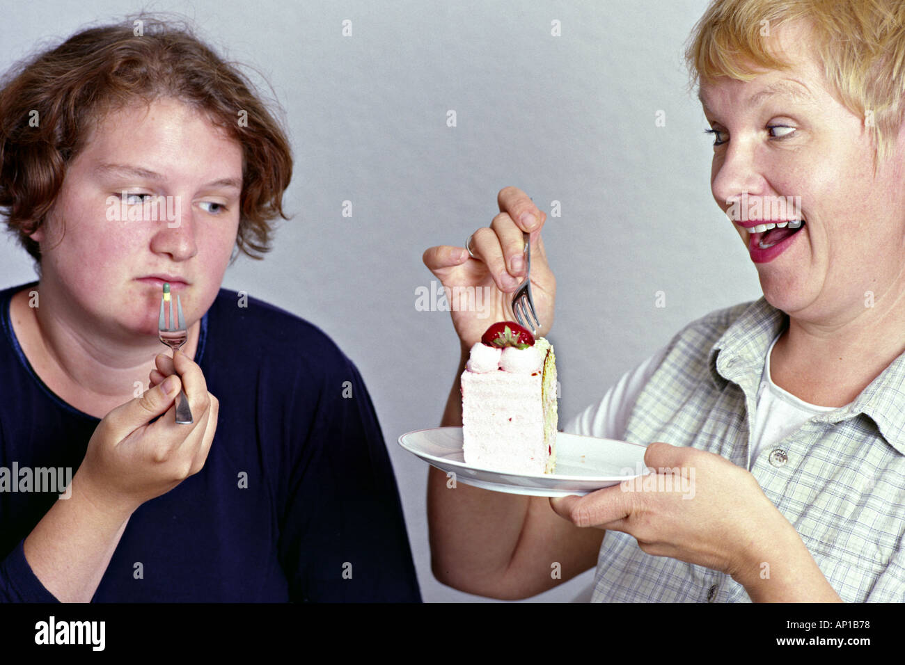 Woman eating with friends pill hi-res stock photography and images - Alamy