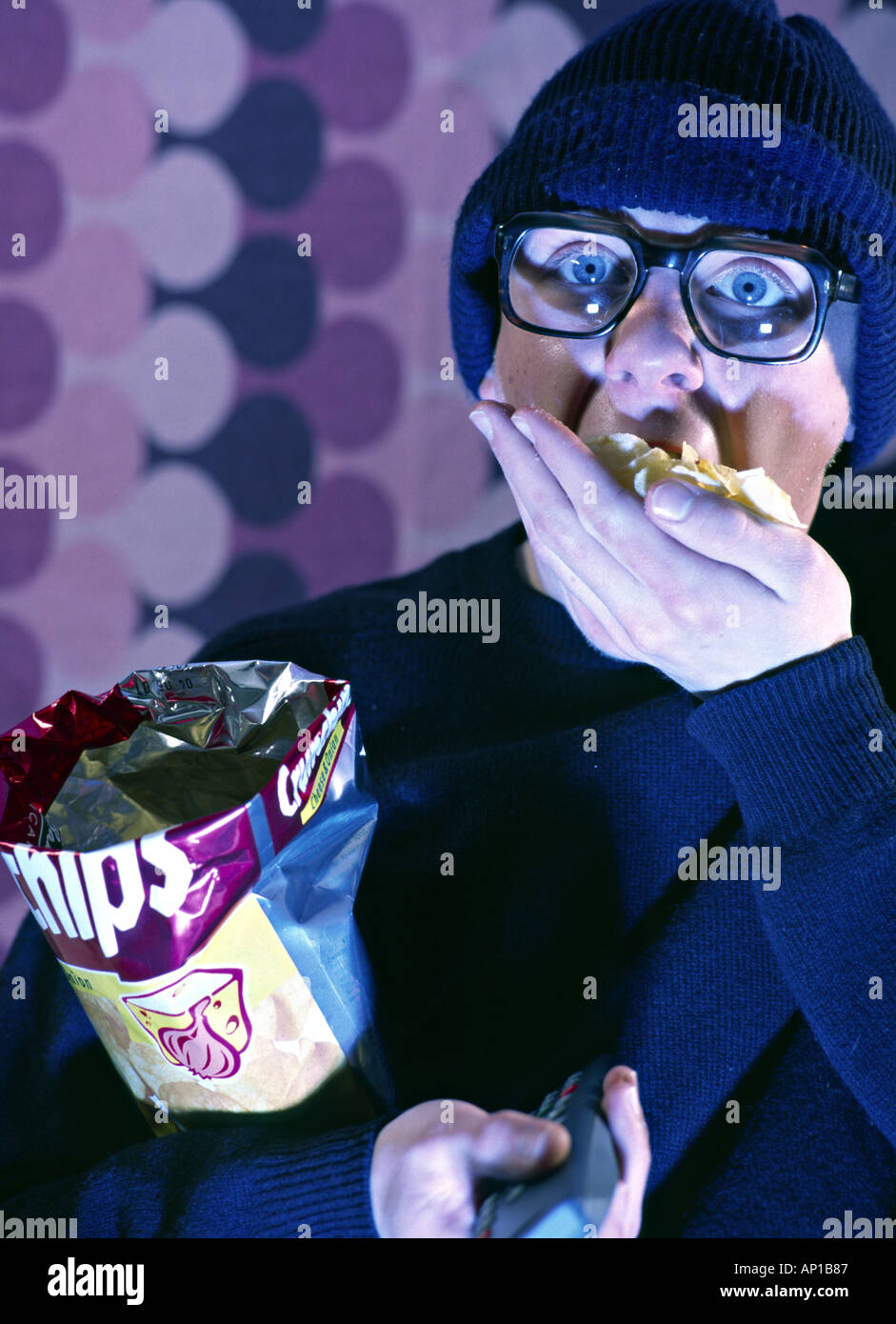 Funny man eating chips hi-res stock photography and images - Alamy