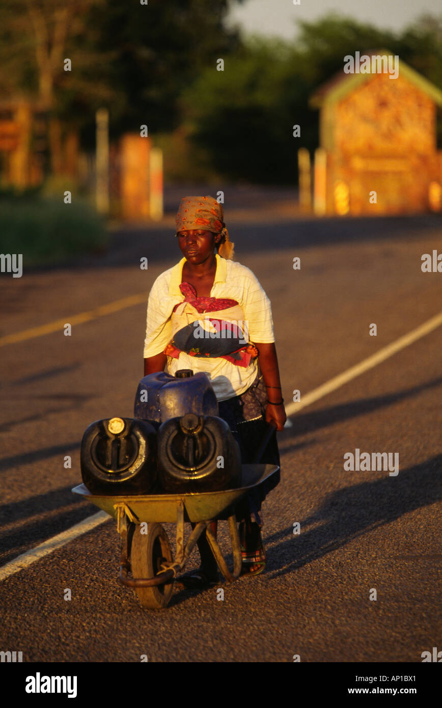 African people carry water hi-res stock photography and images - Alamy