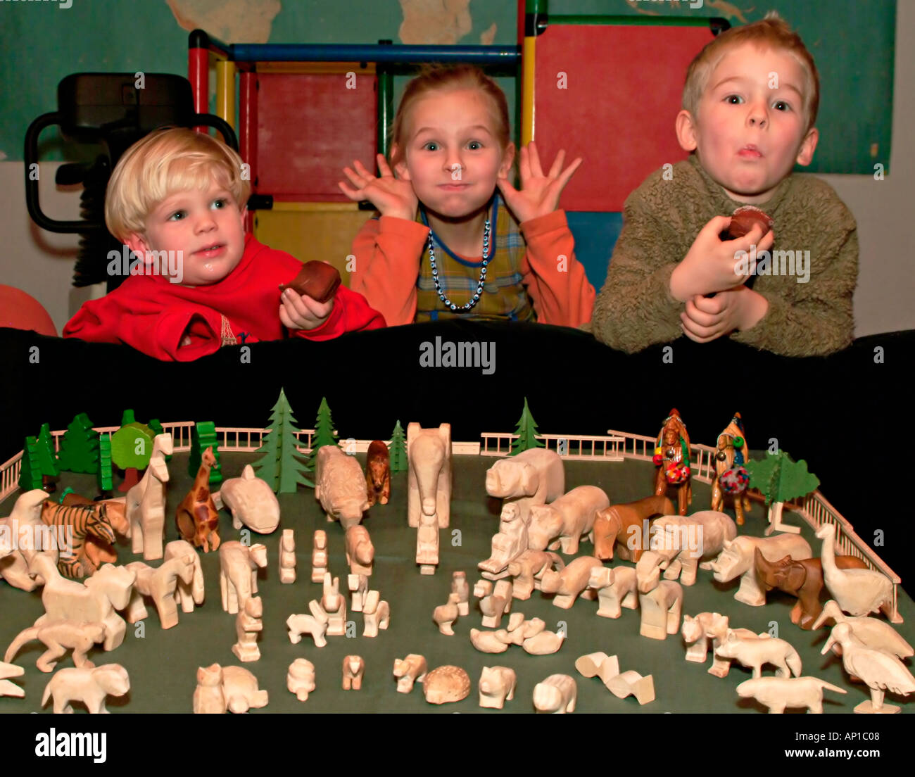 brothers and sisters making funny faces three children playing with ...