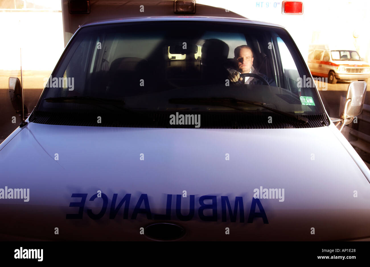 ambulance driver EMT in vehicle Stock Photo - Alamy