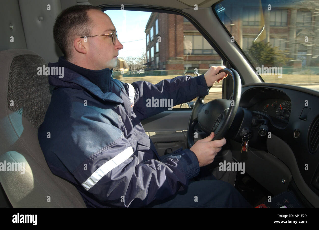 ambulance driver EMT in vehicle Stock Photo - Alamy