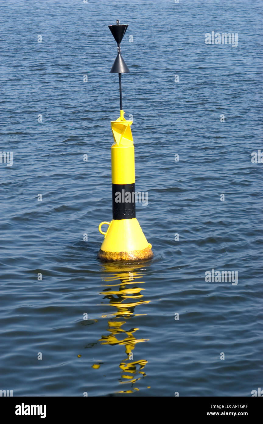 yellow signal buoy "attention ship wreck Stock Photo - Alamy