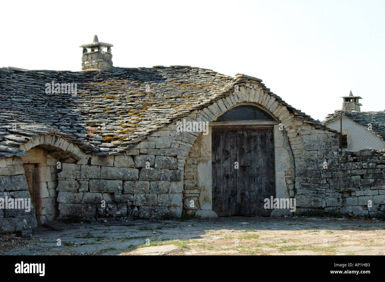 Old stone farm buildings with natural stone roof slates near Chanac ...