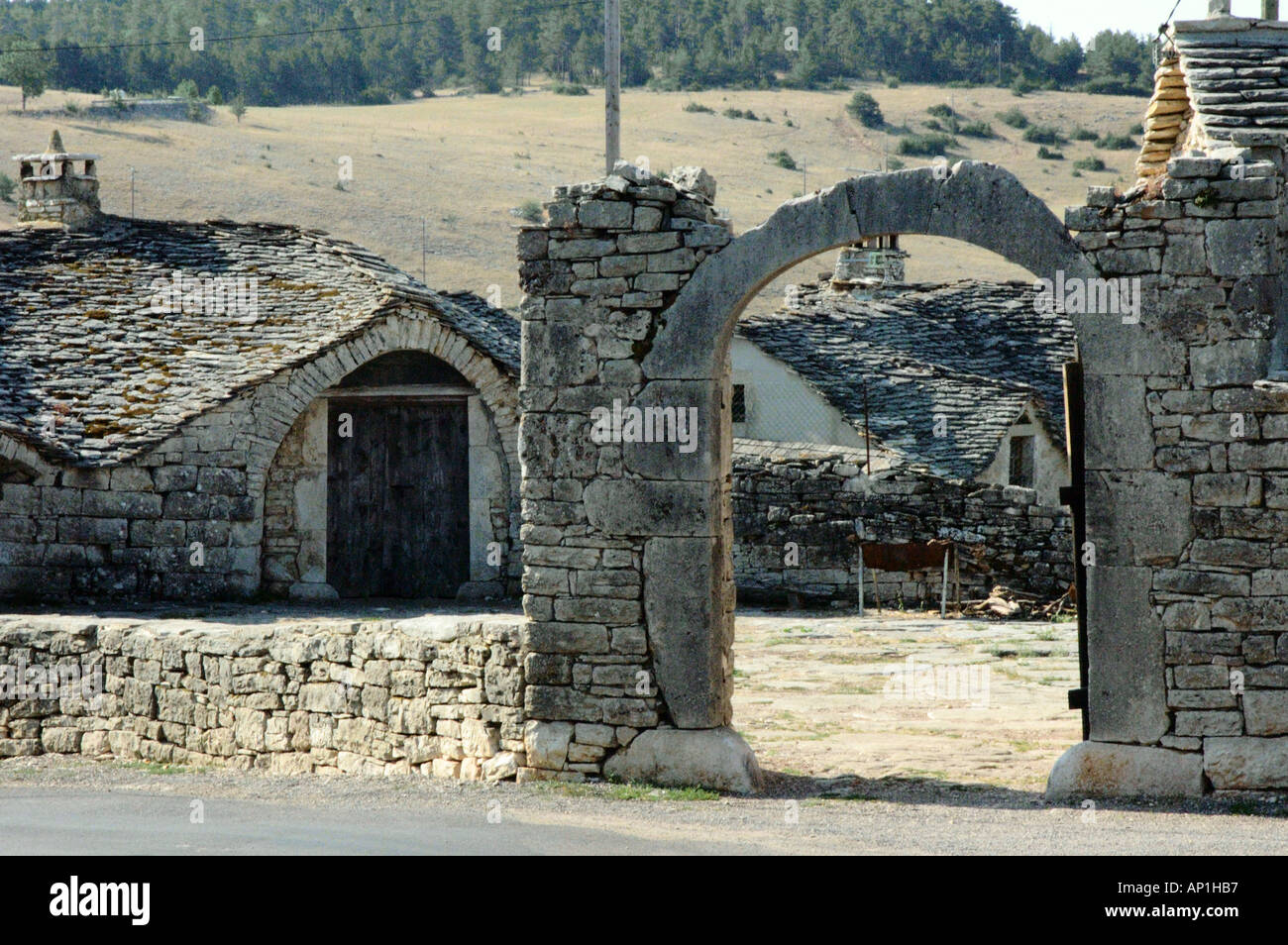 Old stone farm buildings with natural stone roof slates near Chanac ...