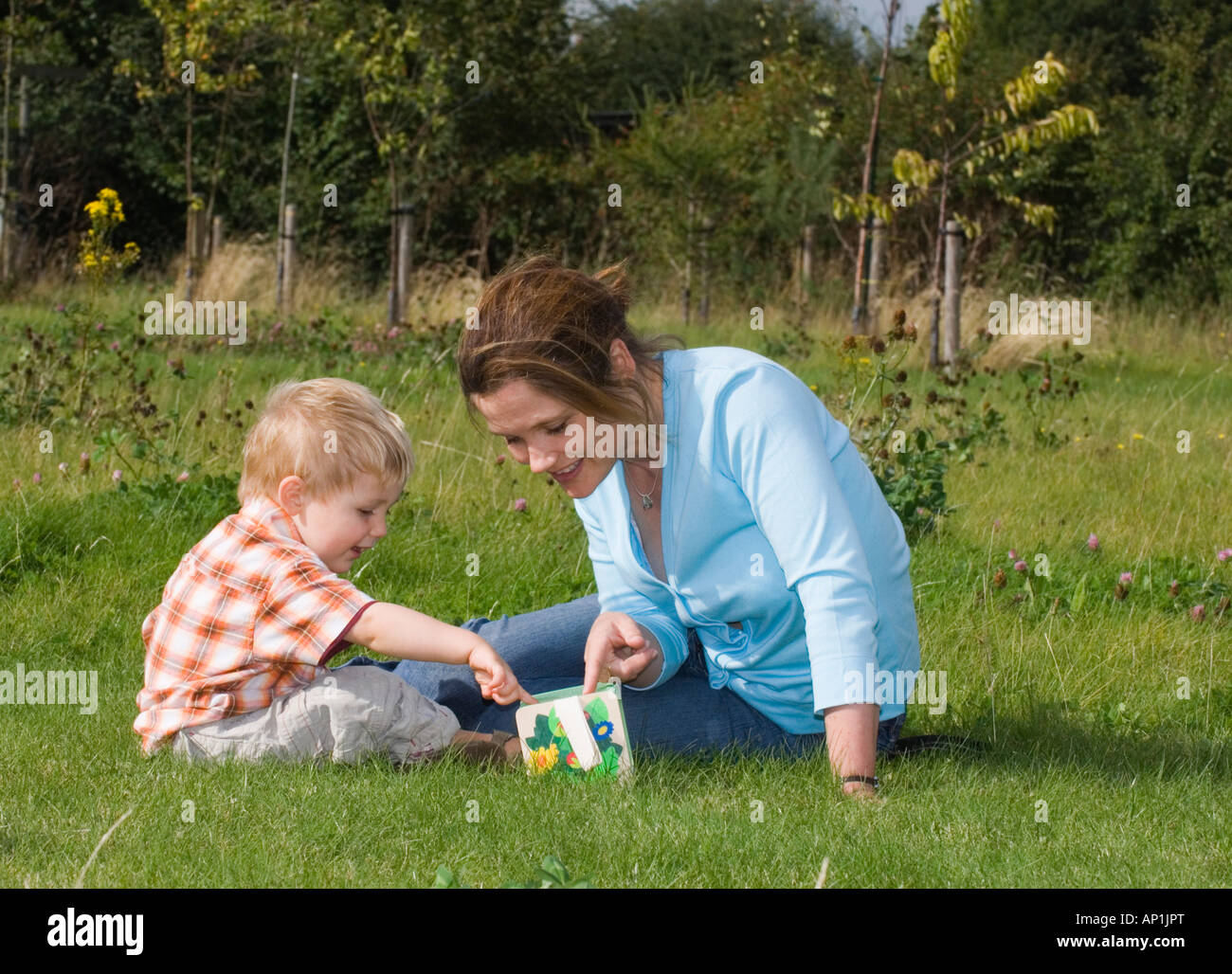 Mother and toddler exploring nature Kent UK summer Stock Photo - Alamy