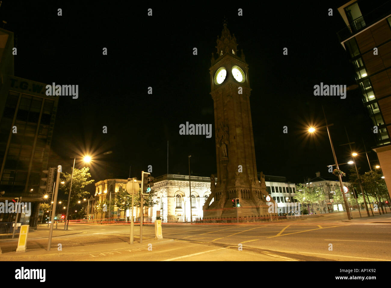 The Albert Memorial Clock road junction in Belfast at night Stock Photo ...
