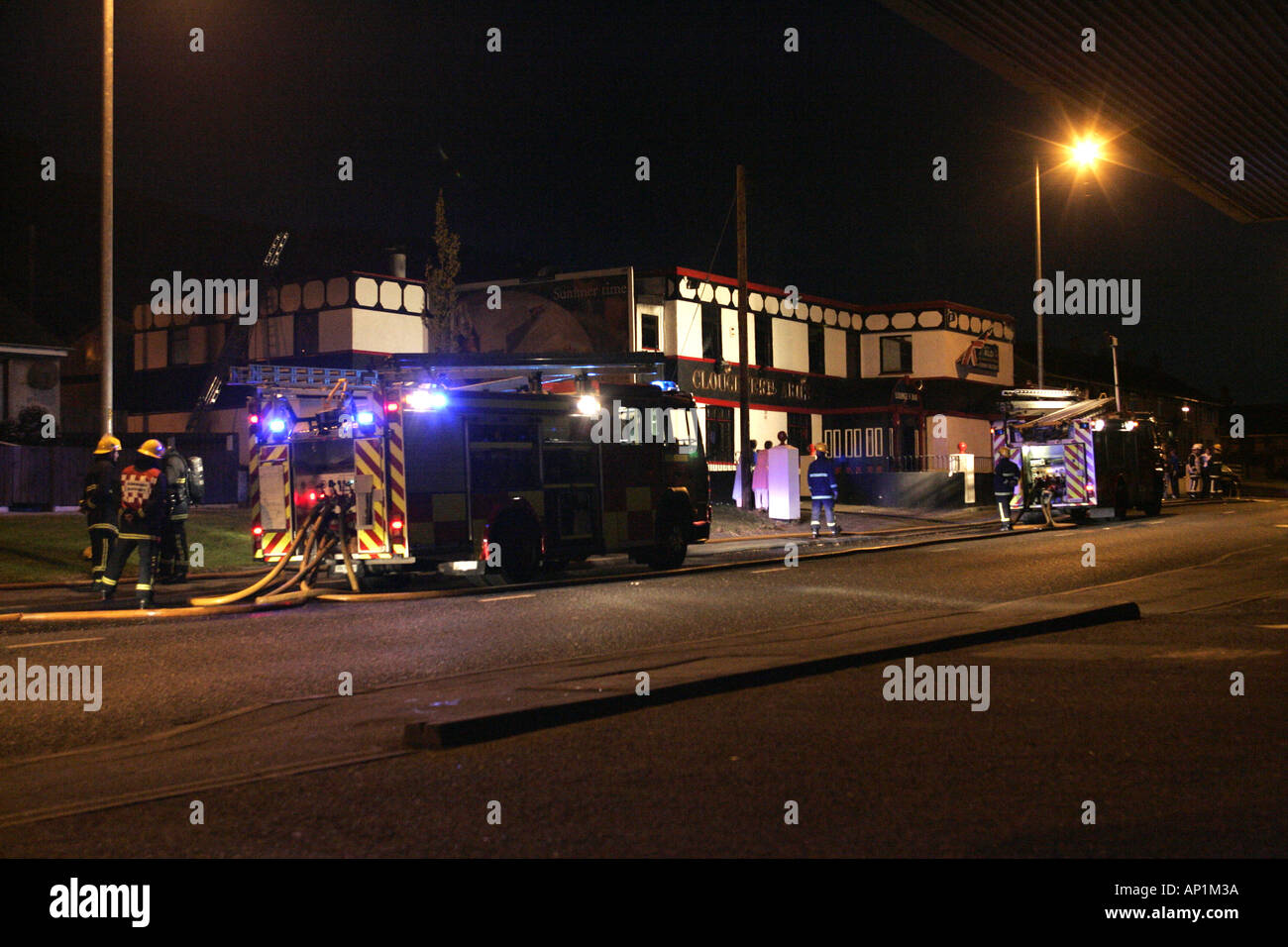 fire service vehicles attend fire at Cloughfern arms during loyalist ...