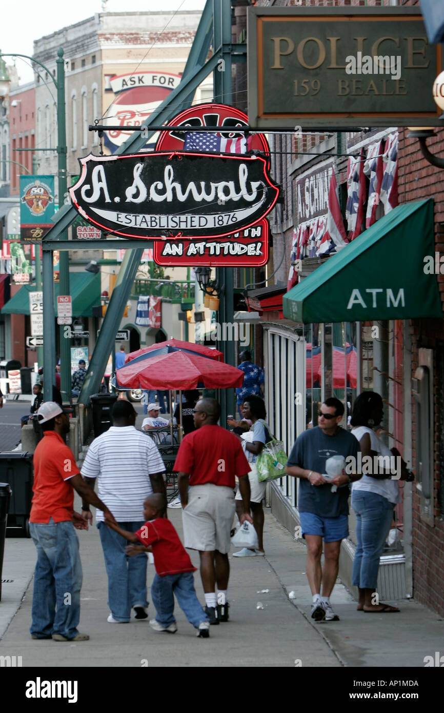 Store signs and afternoon visitors on Beale Street Memphis USA Stock ...