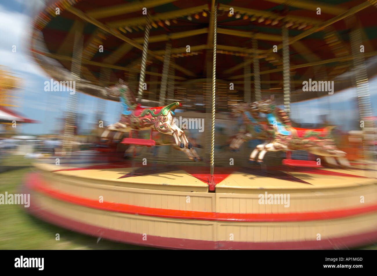 horse carousel pan panning turn Stock Photo - Alamy