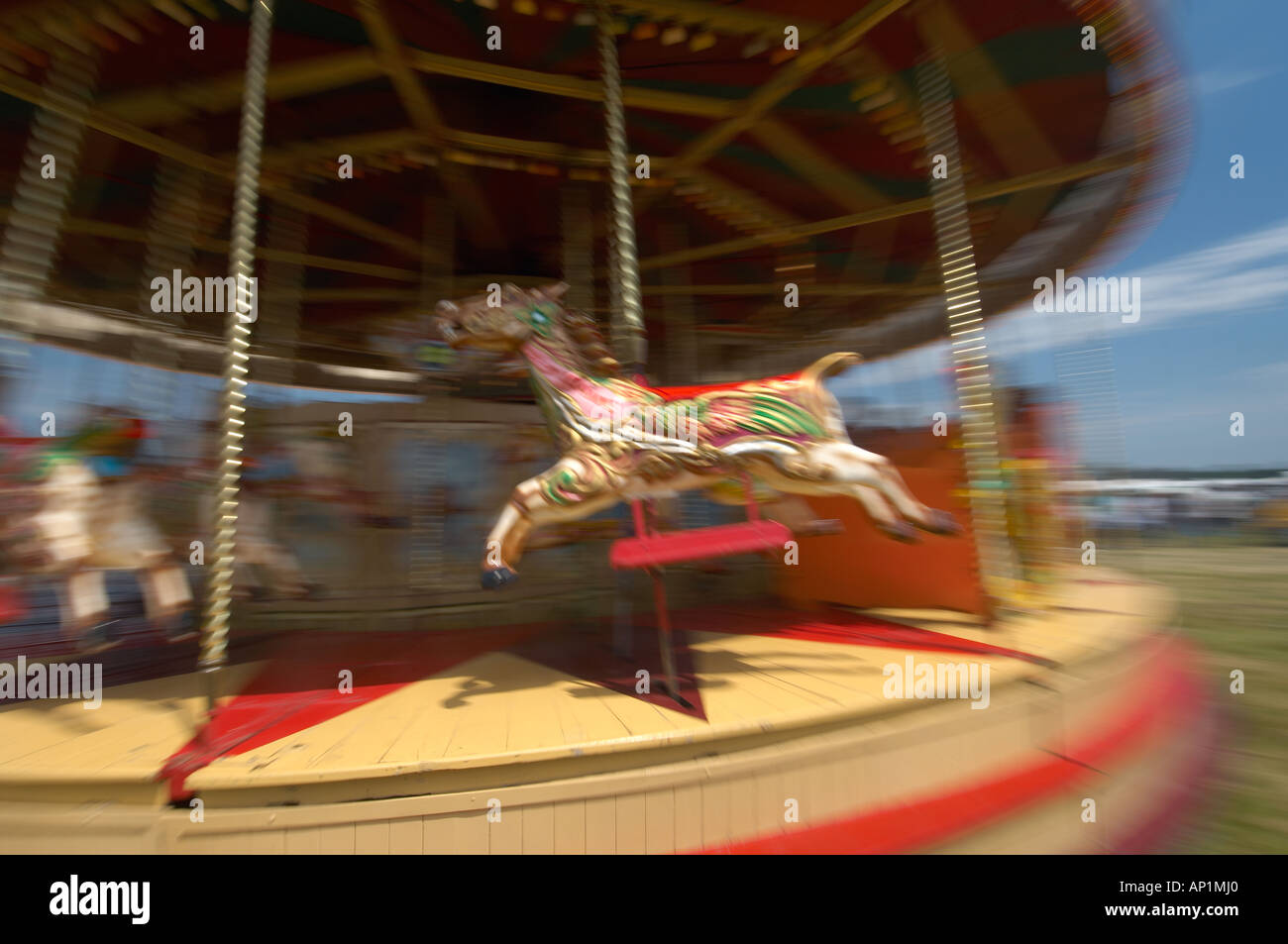 horse carousel pan panning turn Stock Photo - Alamy