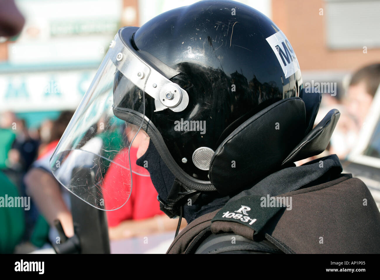 Helmet of PSNI riot officer head and shoulders on crumlin road at ...