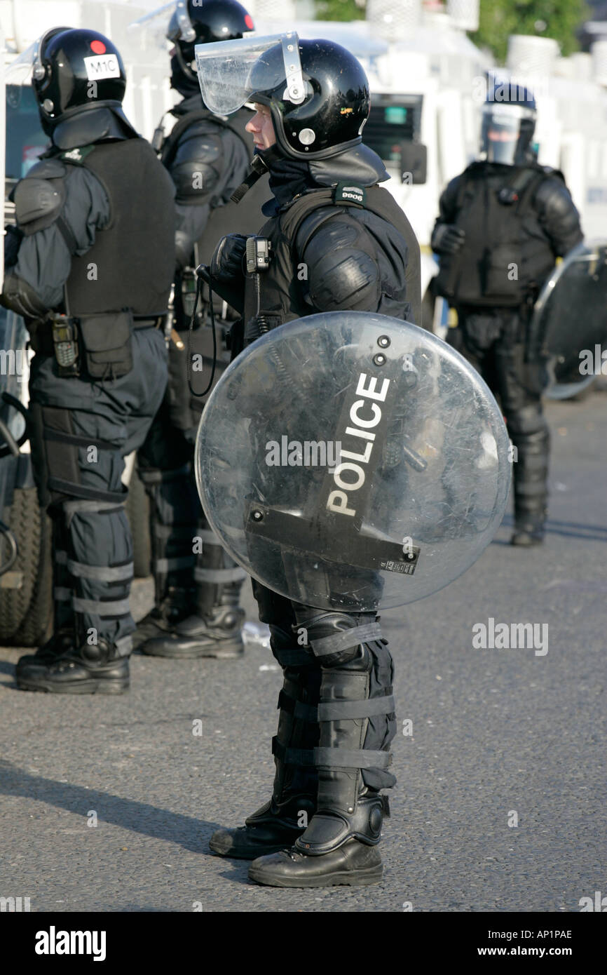 PSNI officer in full riot gear with shield on crumlin road at ardoyne ...