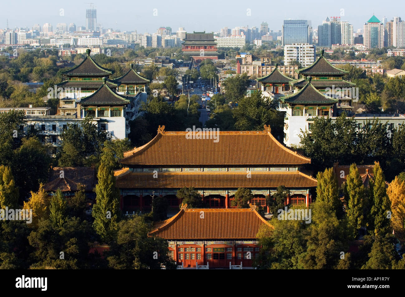 temple buildings in Jingshan Park looking down to the Drum tower in the ...