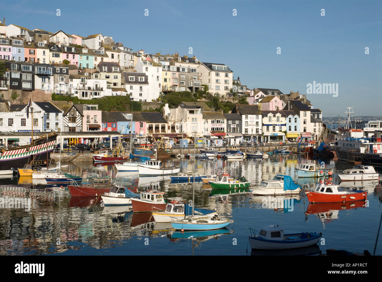 Harbour scene with colourful boats Stock Photo - Alamy