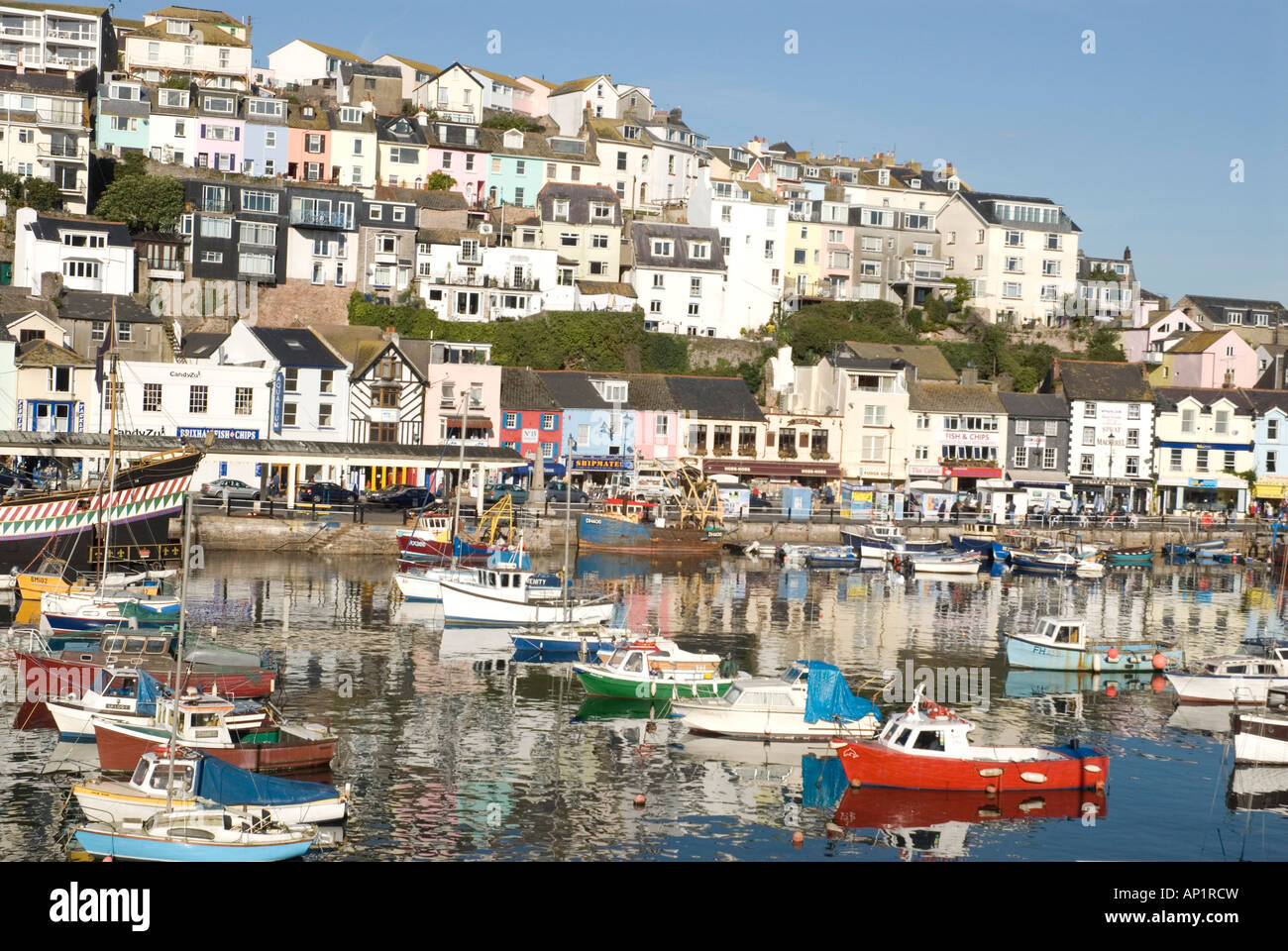 Harbour scene with colourful boats Stock Photo - Alamy