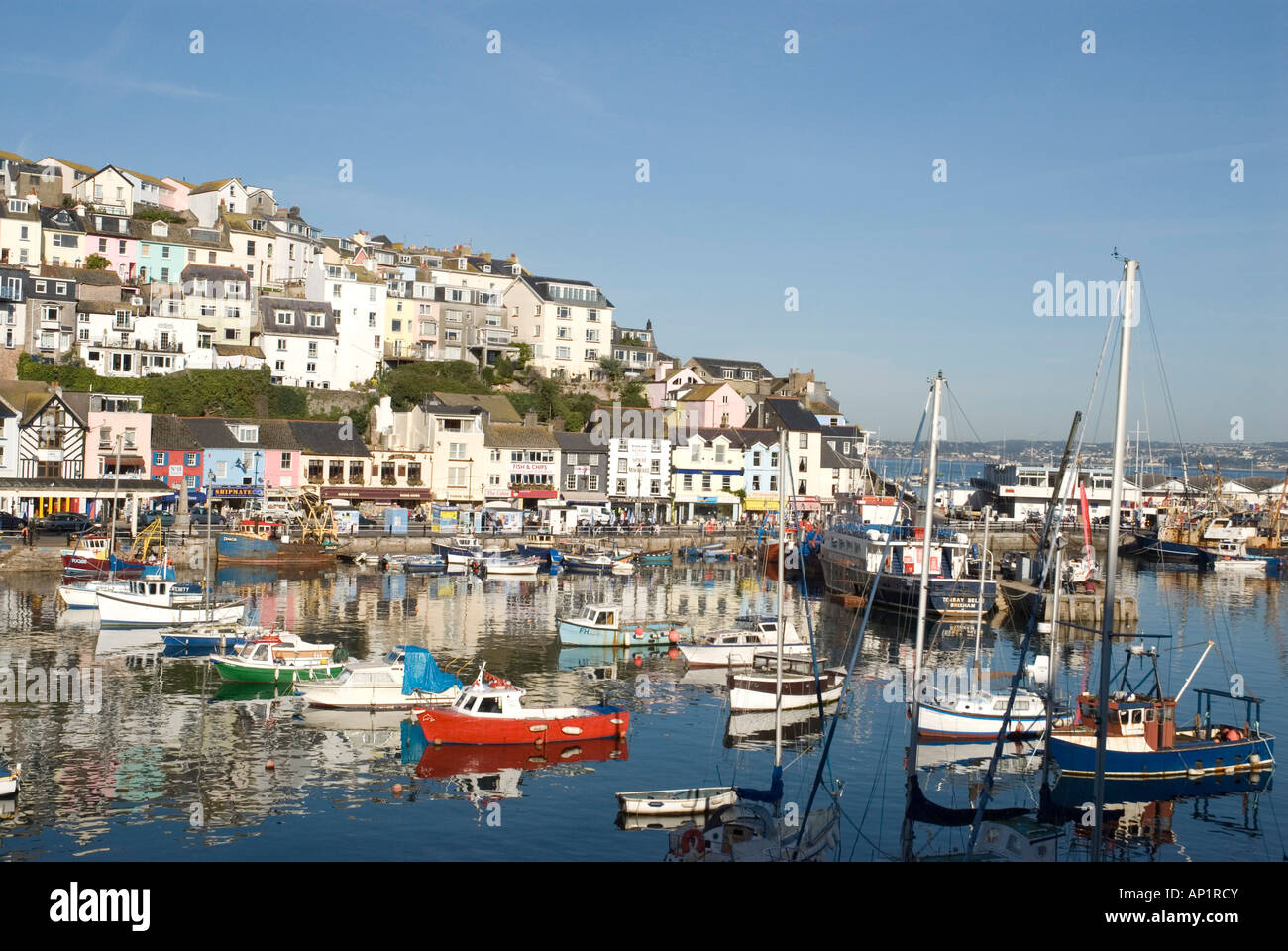 Harbour scene with colourful boats Stock Photo - Alamy