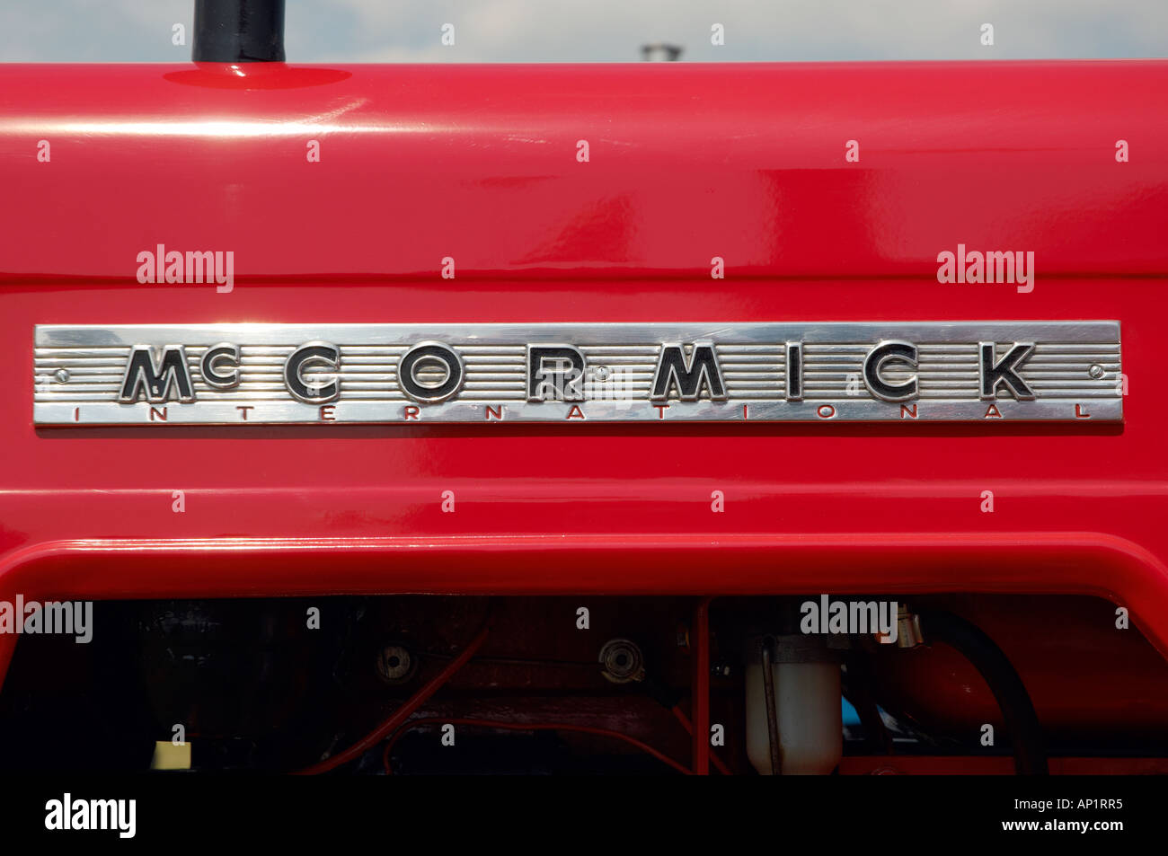 tractor badge on a old tractor Stock Photo - Alamy