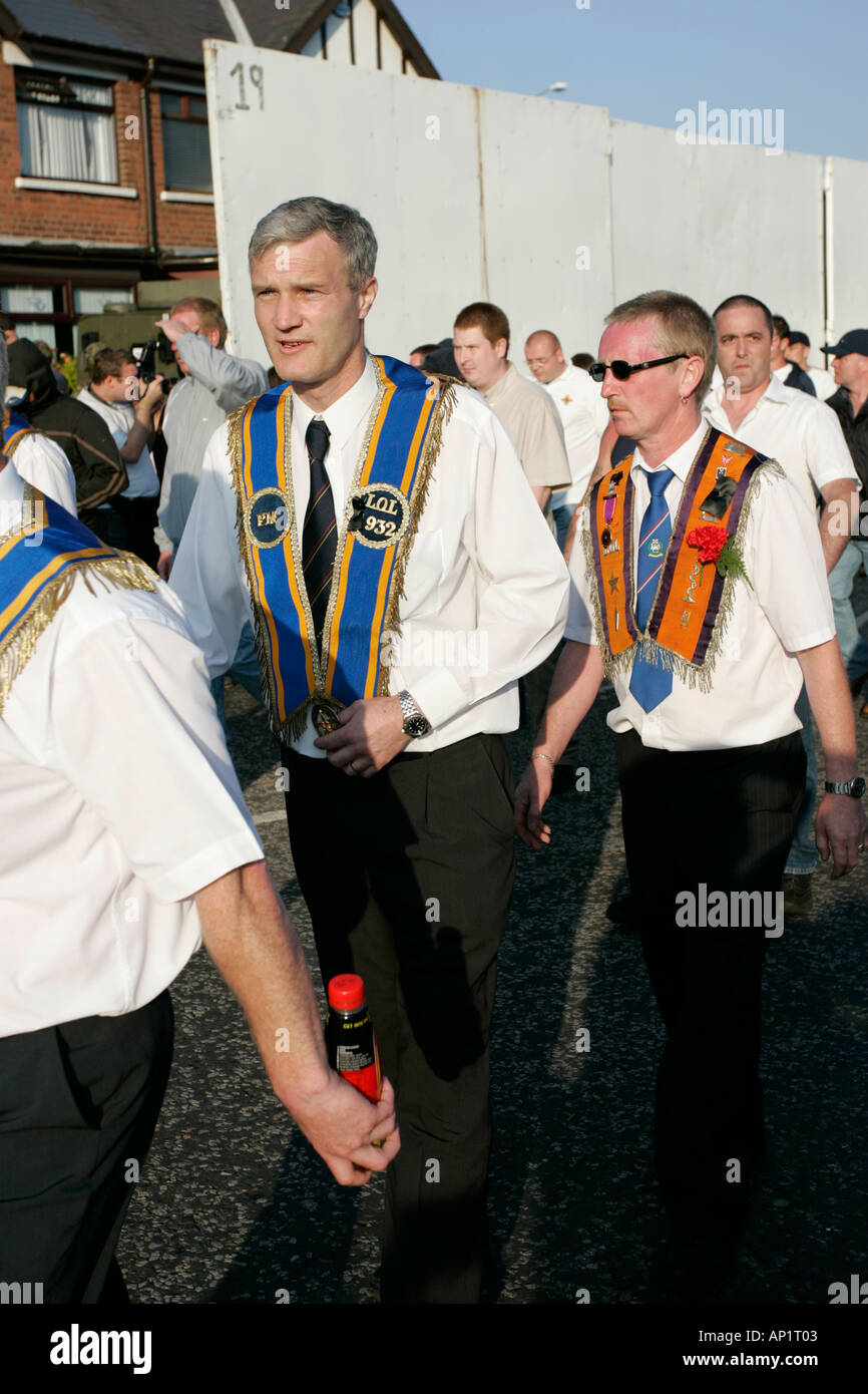 loyalist marchers wearing sashes on crumlin road at ardoyne shops ...