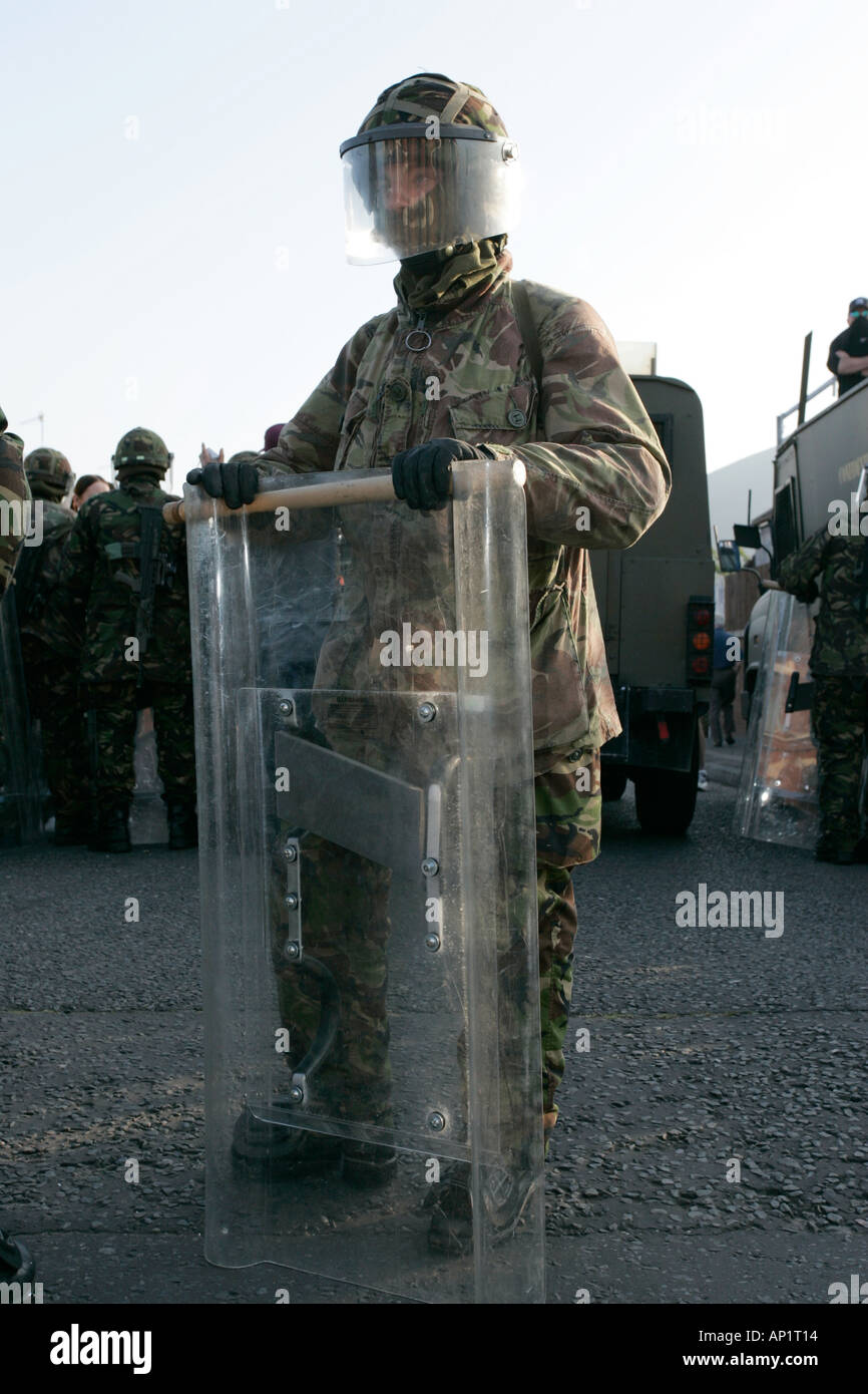 British Army soldier in riot gear stands guard on crumlin road at ...