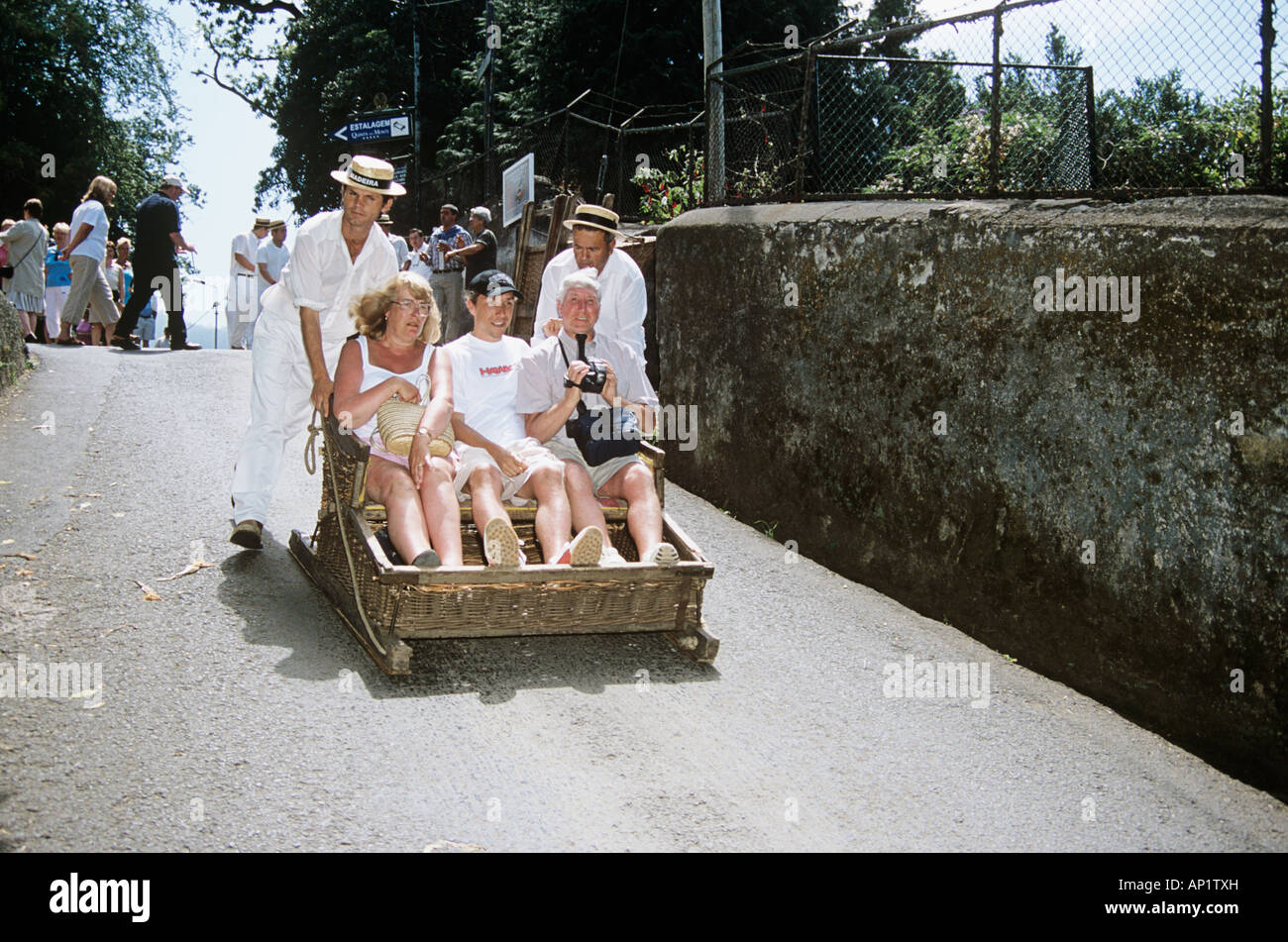 Tourists in Monte toboggan ride, Monte, near Funchal, Madeira Stock ...