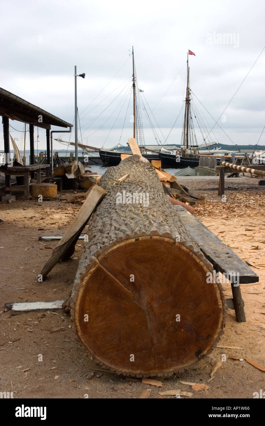 Large log outside Viking Ship Museum Boatyard Roskilde Denmark with two ...