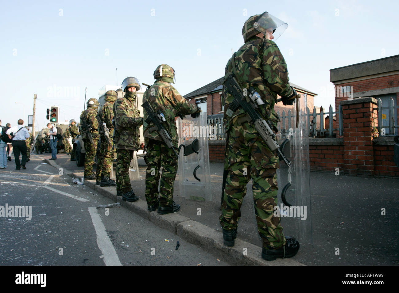 British Army soldiers in riot gear stand guard on crumlin road at ...