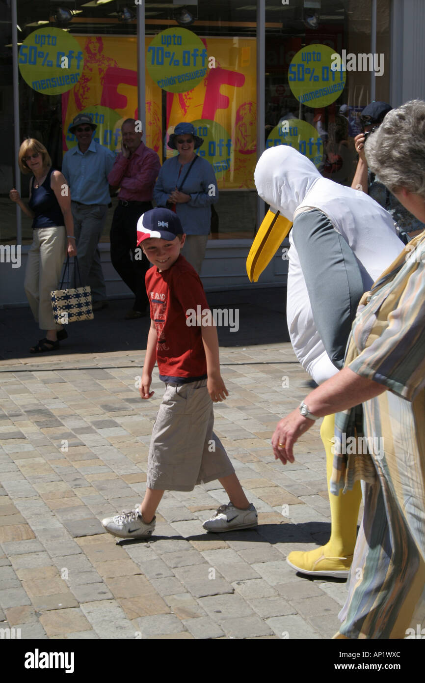 Comedy bird costume act being watched audience hi-res stock photography ...