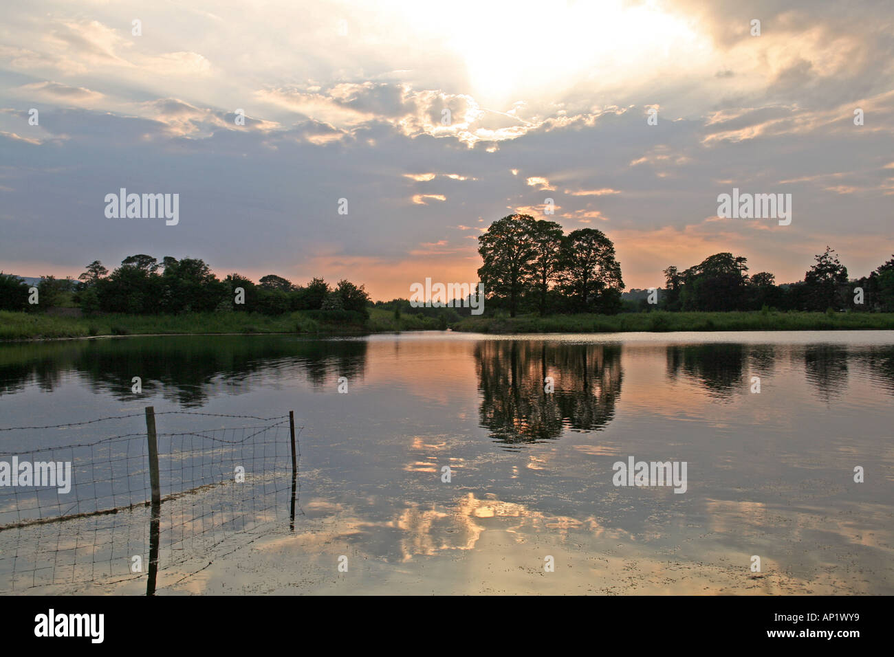 Tree surrounded lake shot over gravel pits in otley hi-res stock ...