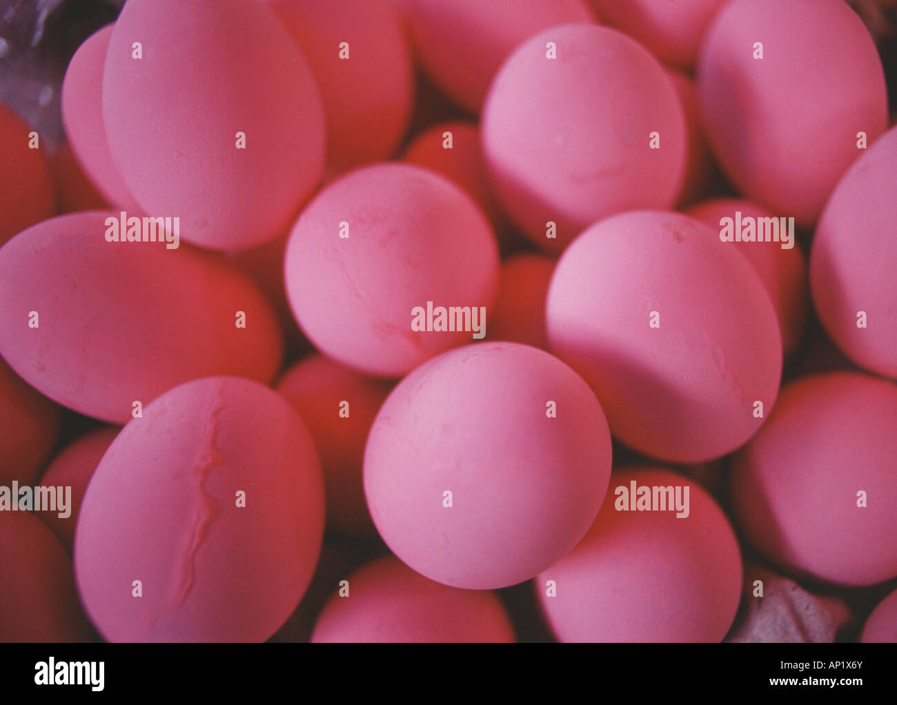 Eggs on pink hi-res stock photography and images - Alamy