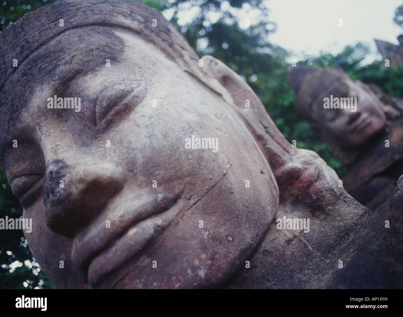 row of head statues, Angkor Wat, Cambodia Stock Photo - Alamy