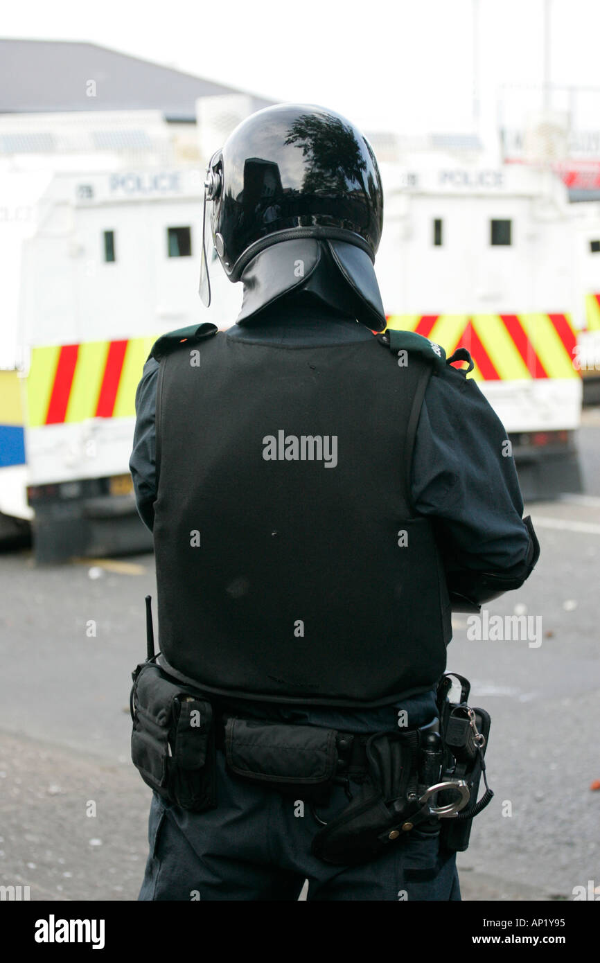 PSNI officer in riot gear on crumlin road at ardoyne shops belfast 12th ...