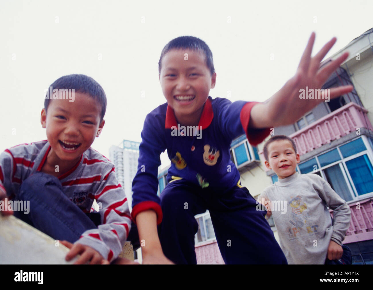 3 asian kids playing on bridge hi-res stock photography and images - Alamy