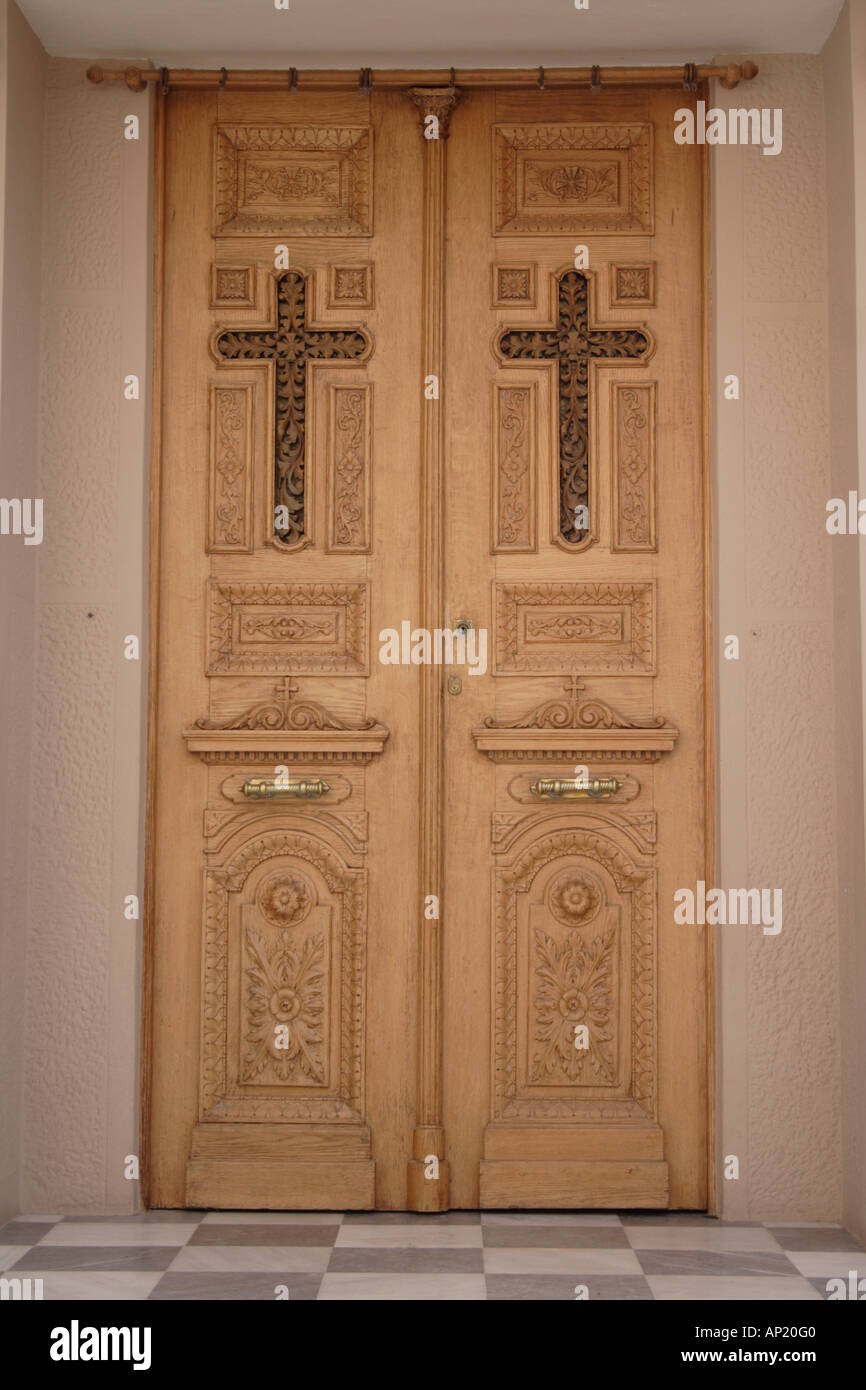 Detailed Woodwork on Church Doors Stock Photo - Alamy