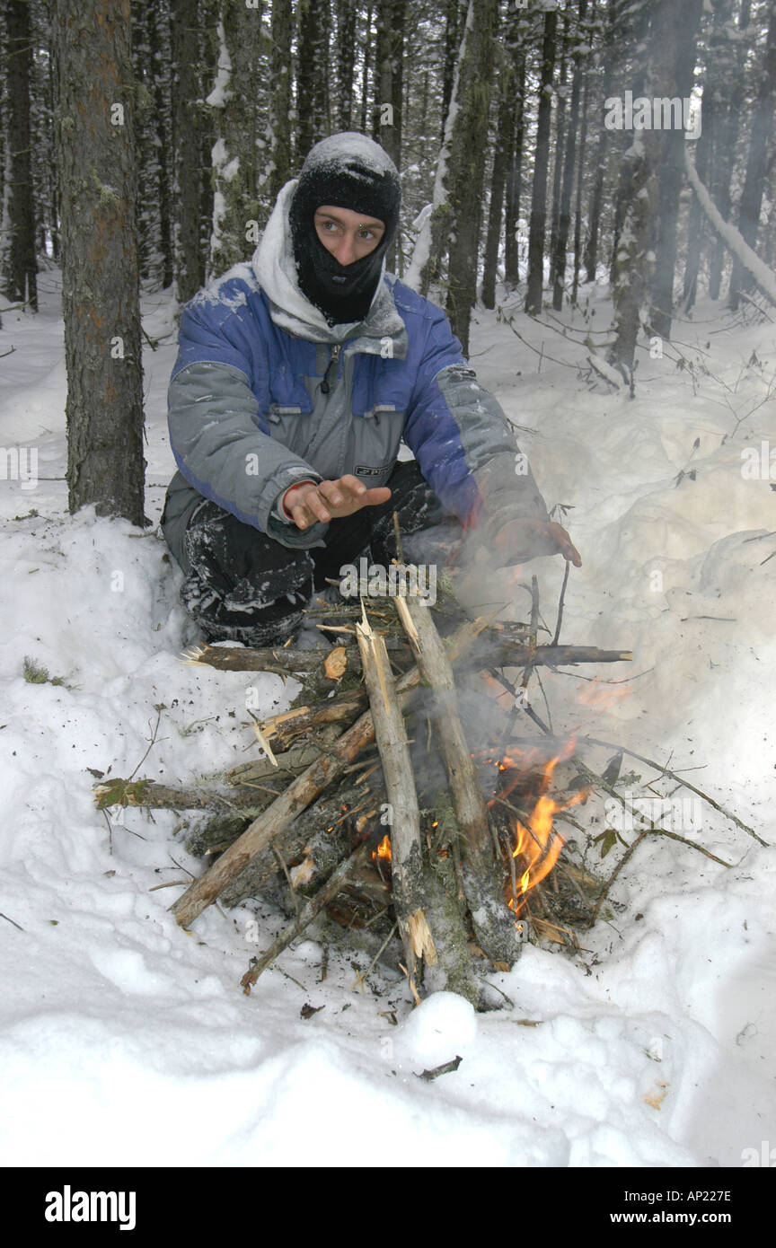 Canada Quebec campfire in the snow Stock Photo - Alamy