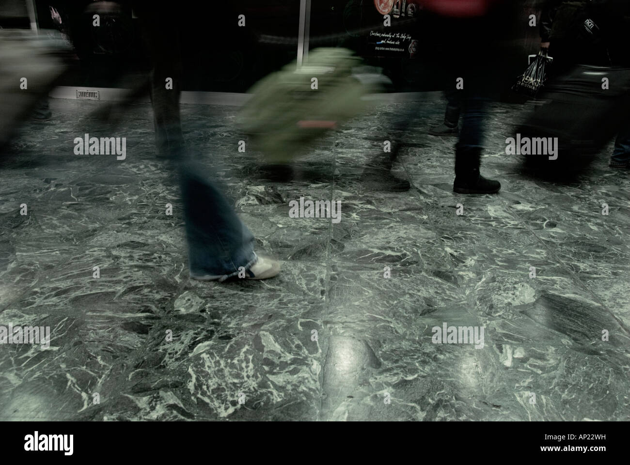 Fast moving blurred feet and marble floor Stock Photo - Alamy