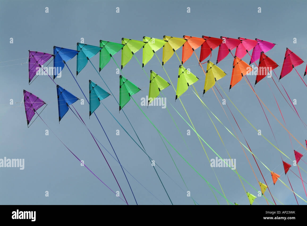 Three strings of colourful stunt kites Stock Photo - Alamy