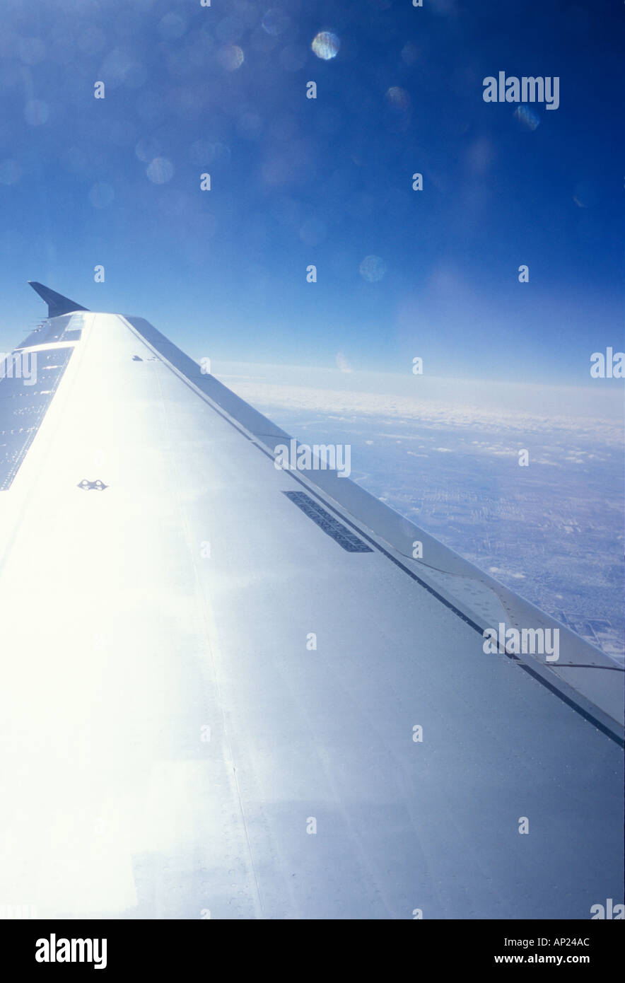 Vertical shot from passenger jet window Stock Photo - Alamy