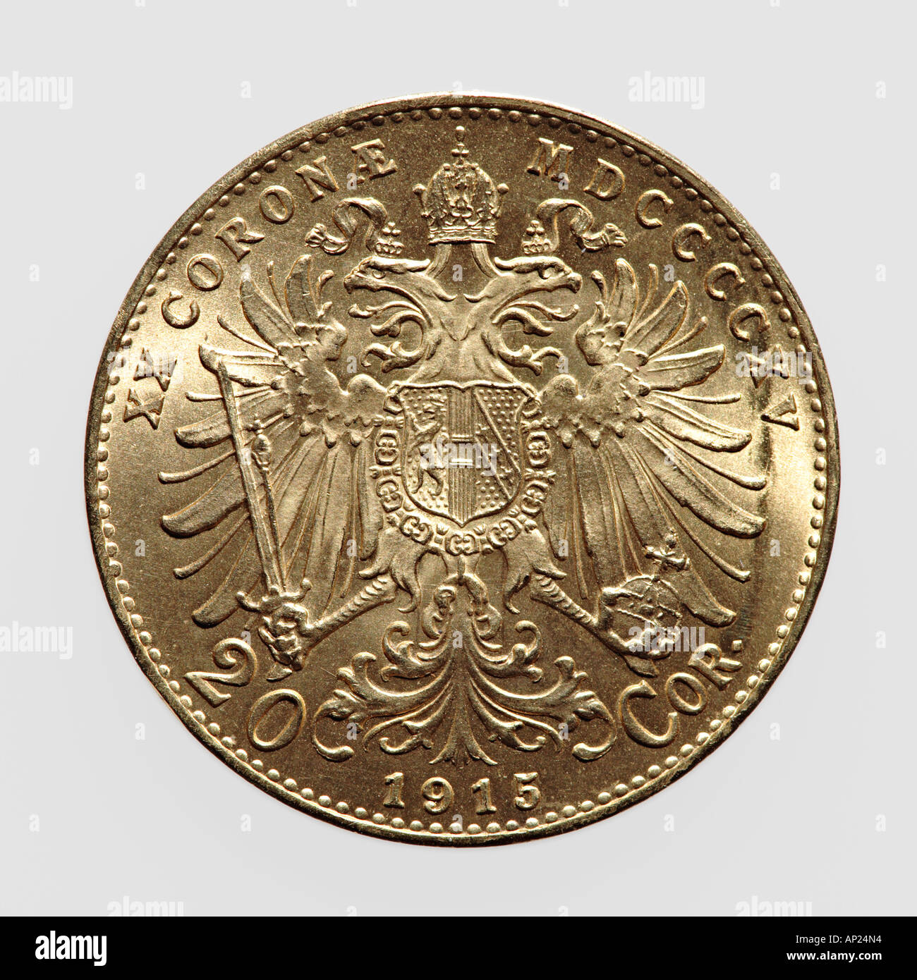 Austrian gold coin against white background 20 corona coined 1915 Stock ...