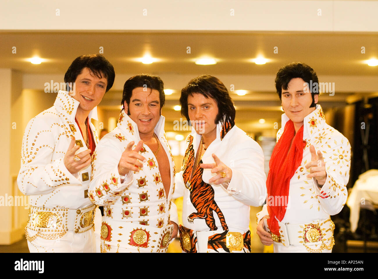 A quartet of Elvis Presley impersonators taking part in an Elvis ...
