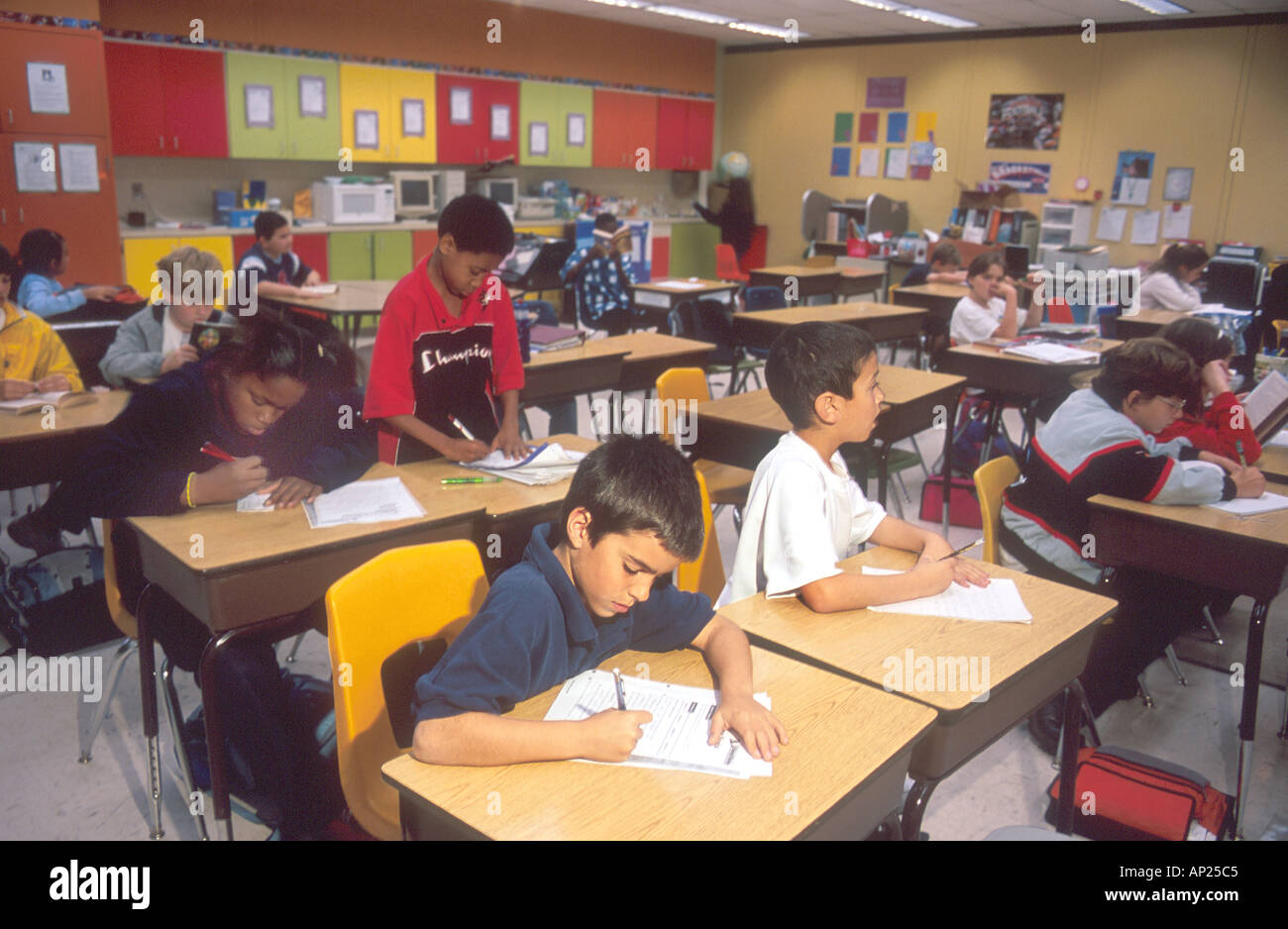 Elementary classroom with students Stock Photo - Alamy